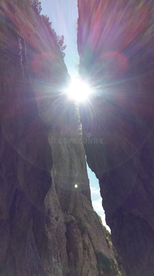 Sunlight Breaking through Rocks Stock Image - Image of stones, sunbeams ...