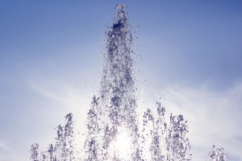 Sunlight Breaks through the Falling Waters of the Fountain Stock Image ...