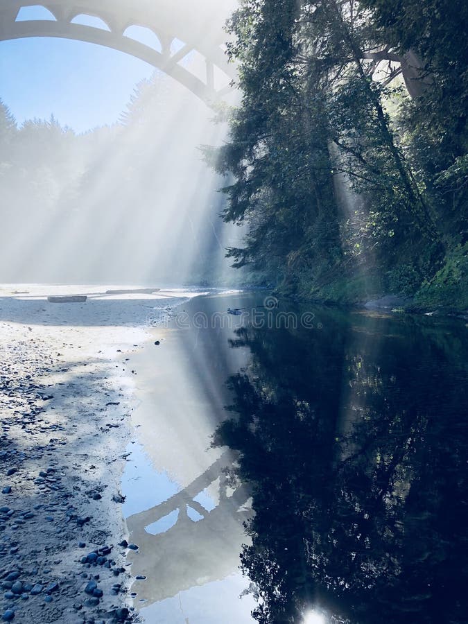 Sunlight bridge reflection stock image. Image of bridge - 135880897