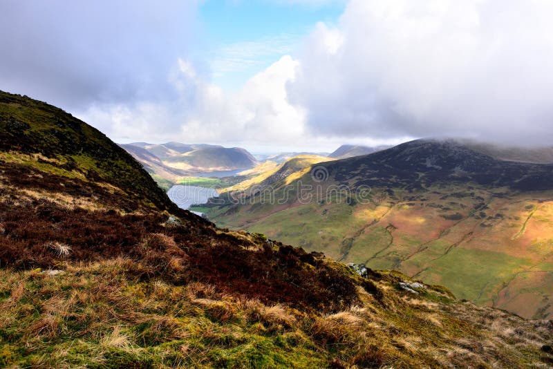 Sunlight on Buttermere and Low Fell Stock Image - Image of clouds ...