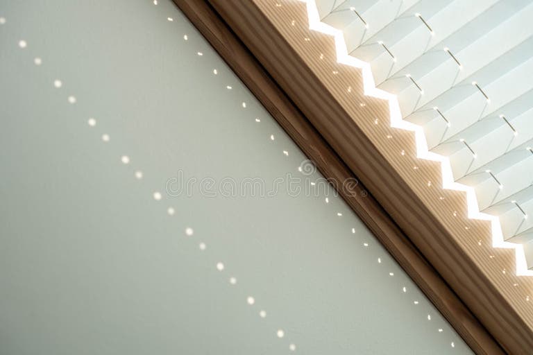 Sunlight Creating Dotted Pattern on Wall through Vertical Blinds and ...