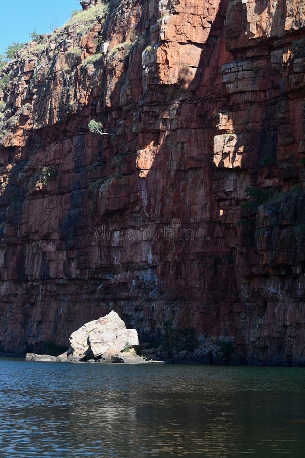 Sunlight Falling Onto a Pile of Rocks in a River Stock Photo - Image of ...