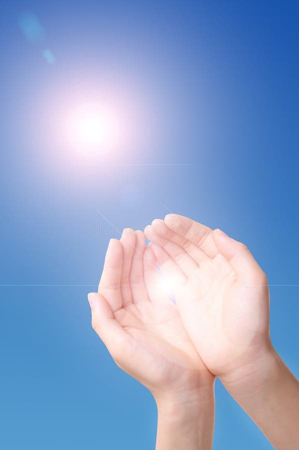 Sunlight through the hands stock photo. Image of finger - 14034702