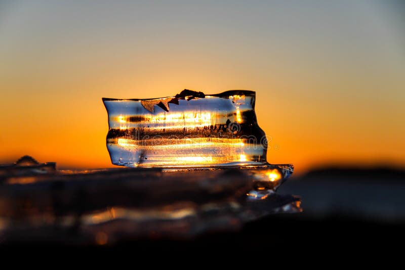 Sunlight through the ice. stock photo. Image of reflection - 35746812