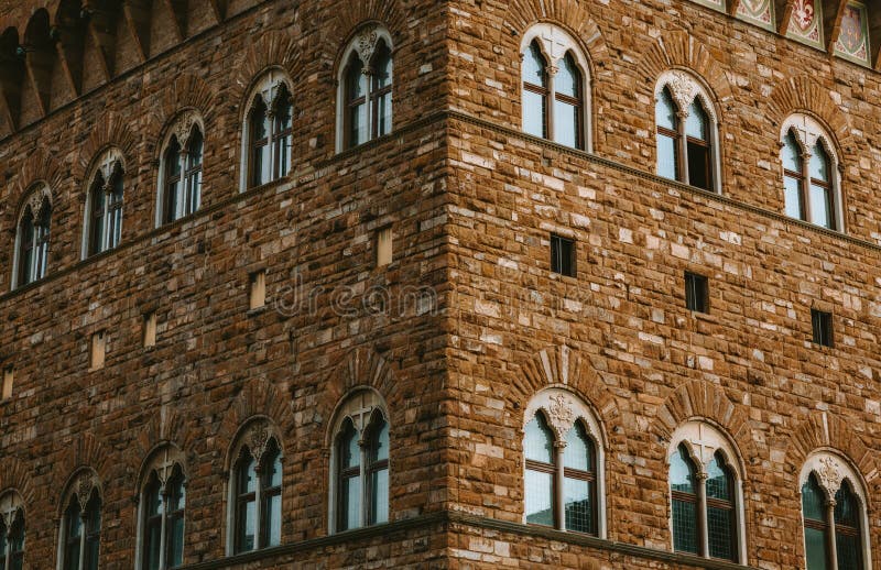 Palazzo Vecchio Showing Its Arched Windows and Brick Facade in Florence ...