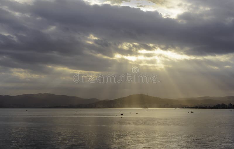 Sunlight Leaking through the Clouds Stock Image - Image of water ...