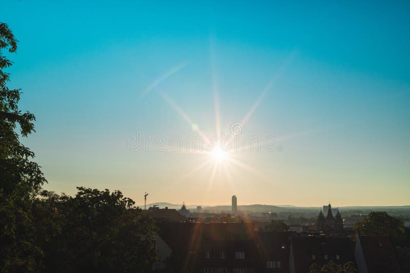 Sunlight Lighting Up the Sky Over the City Horizon Stock Photo - Image ...