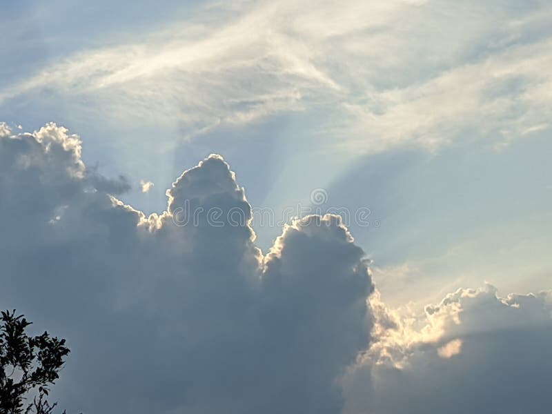 Sunlight Peeking through Clouds, Creating Beautiful Crepuscular Rays ...