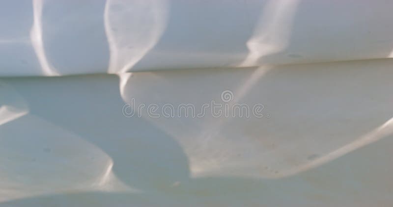 Sunlight Reflecting Off the Gentle Waves of a Water Surface, Creating a ...