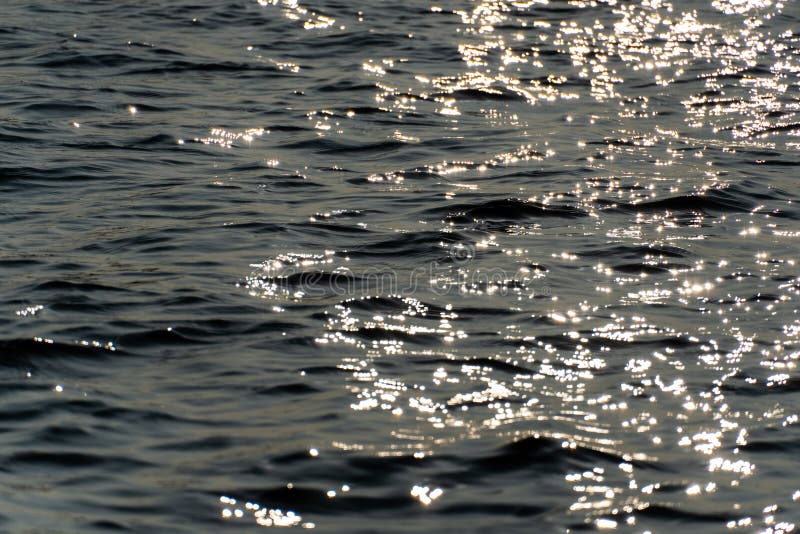 Sunlight Reflections on Gentle Water Waves Stock Image - Image of ...
