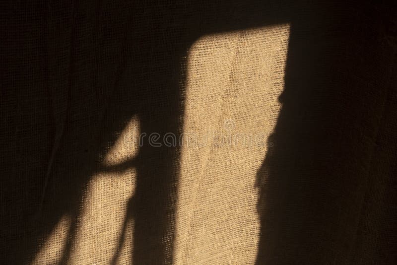 Sunlight and Shadow on a Background of Linen. Hard Light Stock Photo ...