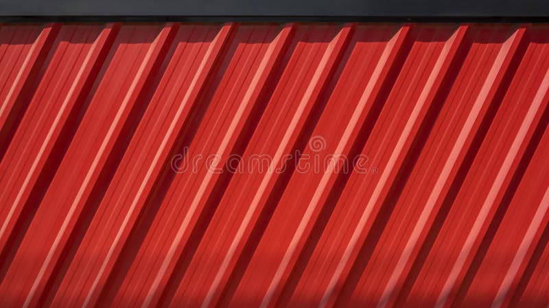 Sunlight and Shadow on Diagonal Pattern of Red Corrugated Steel Fence ...