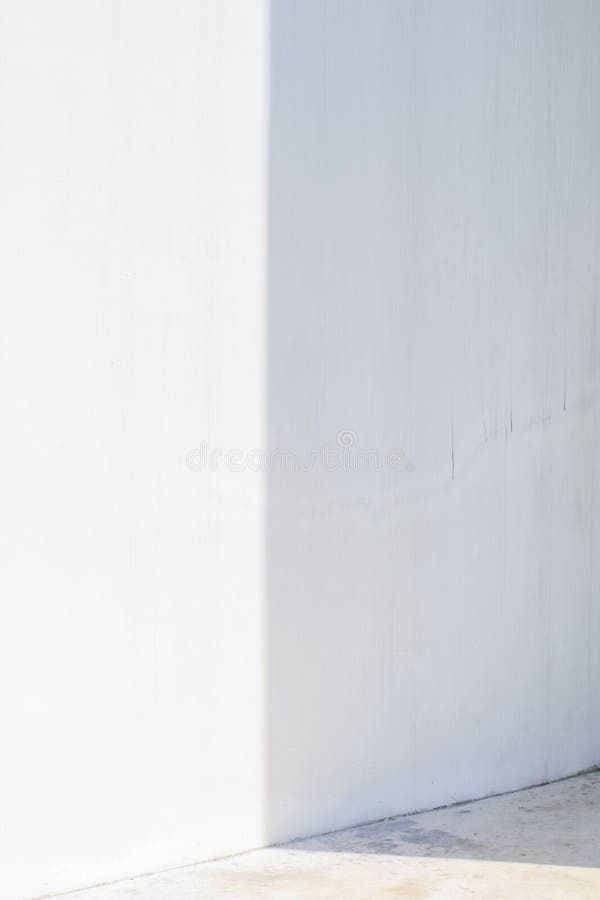Sunlight and Shadow Make Corner Line on Minimal White Wall with Green ...