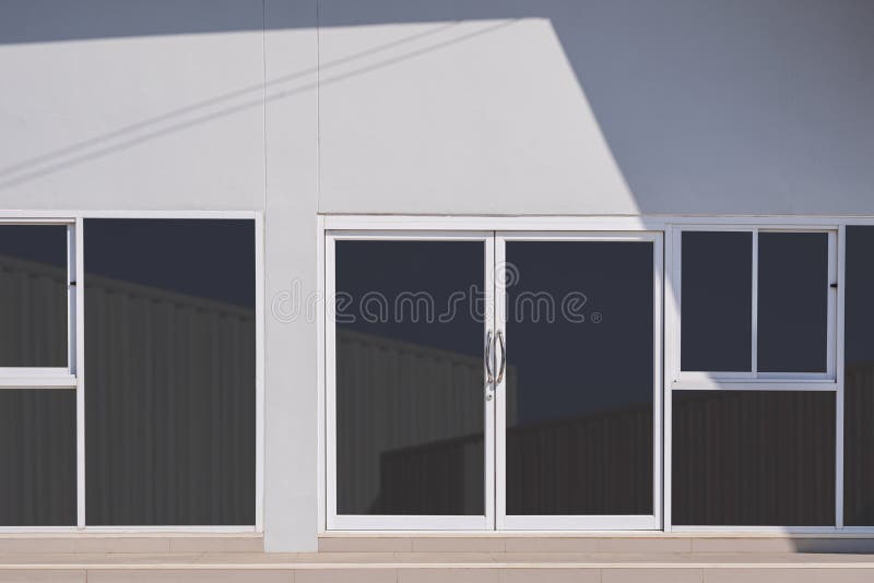 Sunlight and Shadow on Surface of Glass Door and Windows on Entrance ...