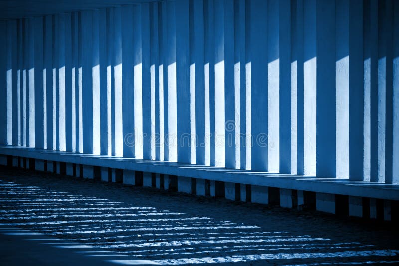 Sunlight and Shadows through Columns of Building Stock Image - Image of ...