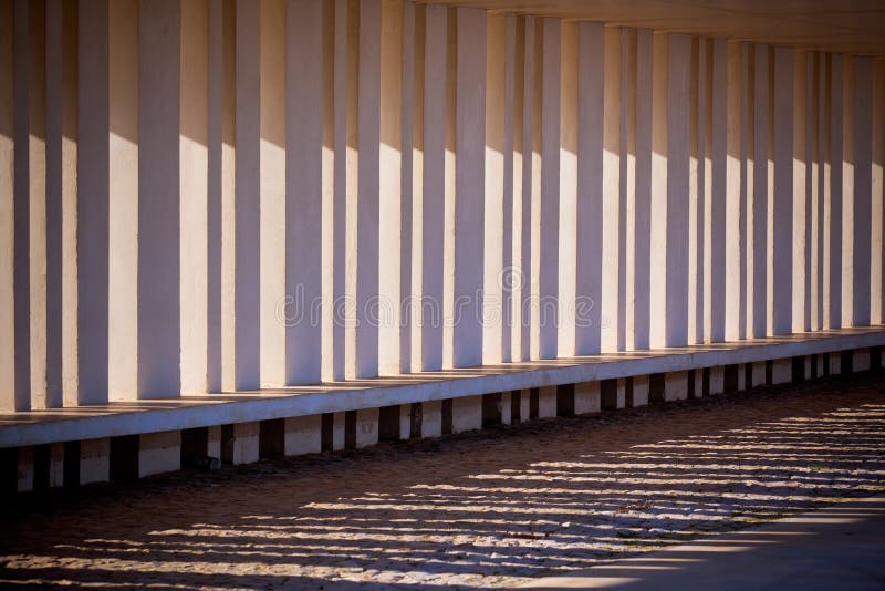 Sunlight and Shadows through Columns of Building Stock Photo - Image of ...