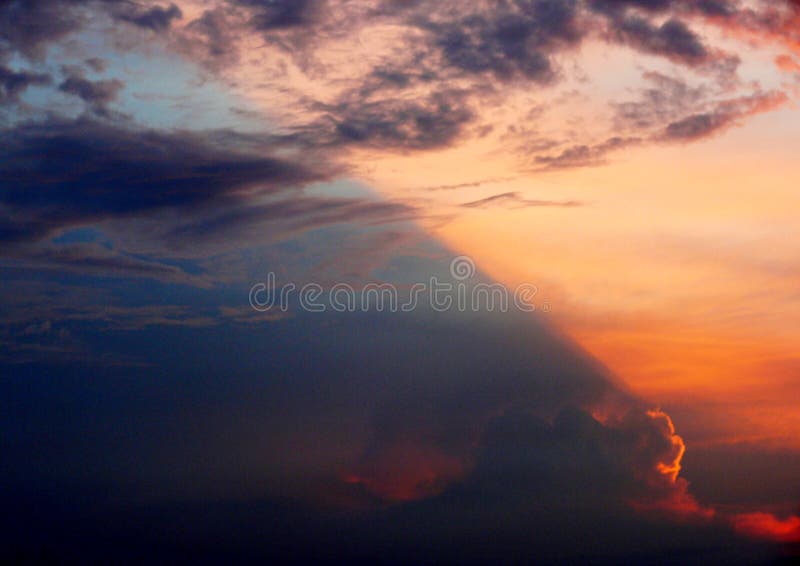 Sunlight Shines on the Dark Clouds Stock Image - Image of partly ...
