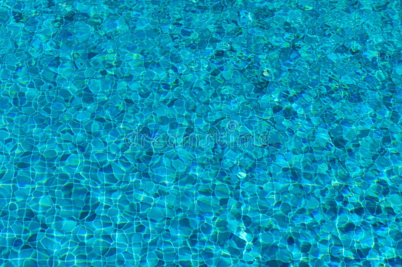 The Shimmering Turquoise Ripples Dance in the Sunlight Above a Tranquil ...