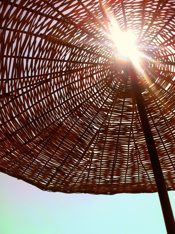 Wicker Umbrella Under Sunlight. Stock Image - Image of sand ...