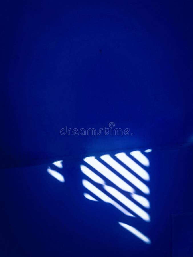 Sunlight Window Overlay Reflection on Blue Wall Separated by Line Stock ...