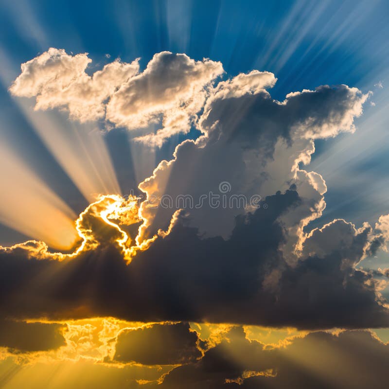 Sunlights Radiant Rays Filter through Dramatic Cloud Formations Stock ...