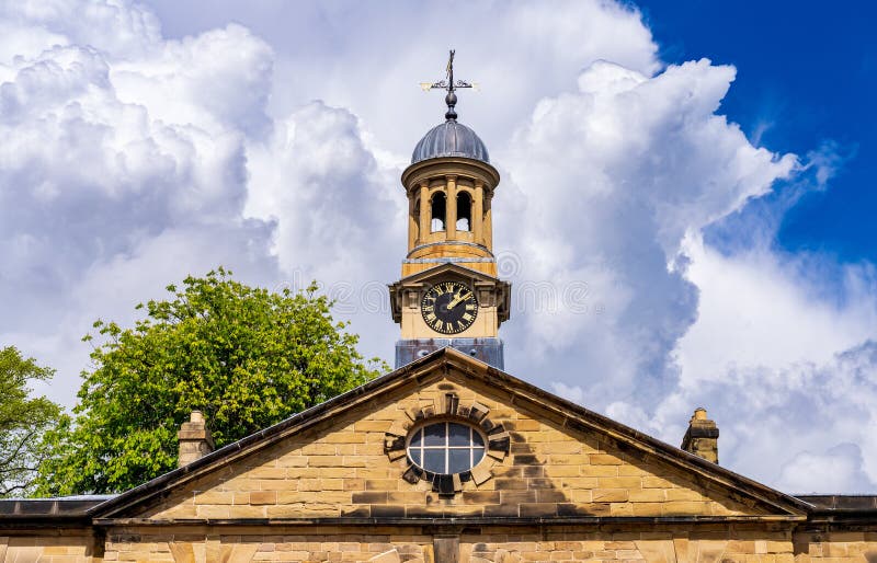 Sunlit Clock Tower of Stone Stable Block with Dramatic Sky Stock Photo ...