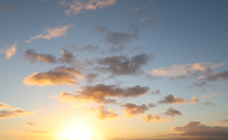 Sunlit clouds in sky stock photo. Image of dawn, summer - 152961374