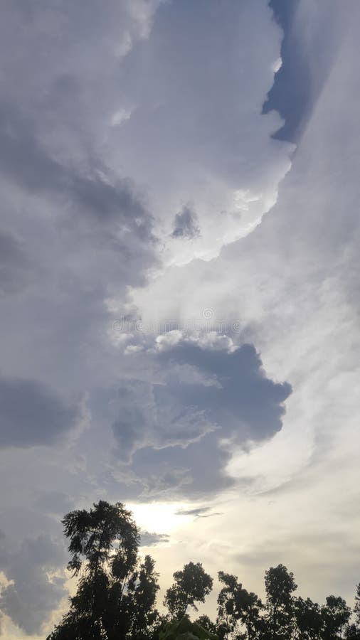 Sunlit clouds stock photo. Image of sunlit, thick, clouds - 262018234