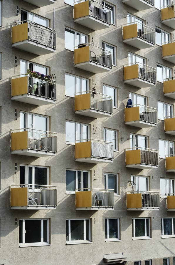 Sunlit Facade of High-rise Building with Balconies Stock Image - Image ...