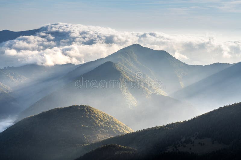 Sunlit mountains stock photo. Image of beautiful, sunset - 296752012