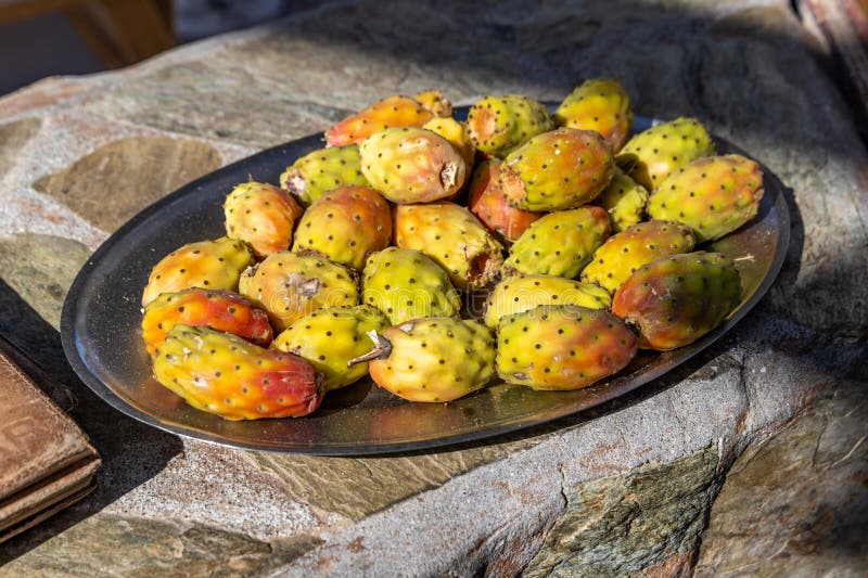 Sunlit Prickly Pear Fruits Collected on a Rustic Stone Plate in Greece ...