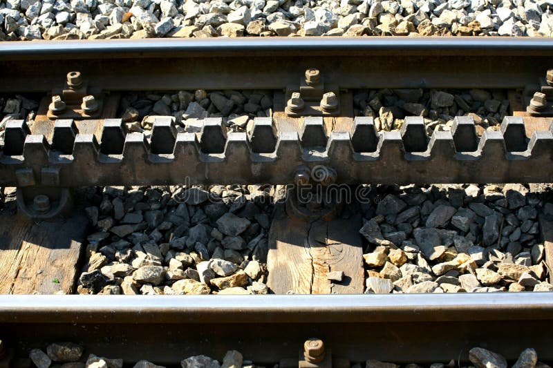 Sunlit Railway Track with Gravel Stones Stock Photo - Image of journey ...