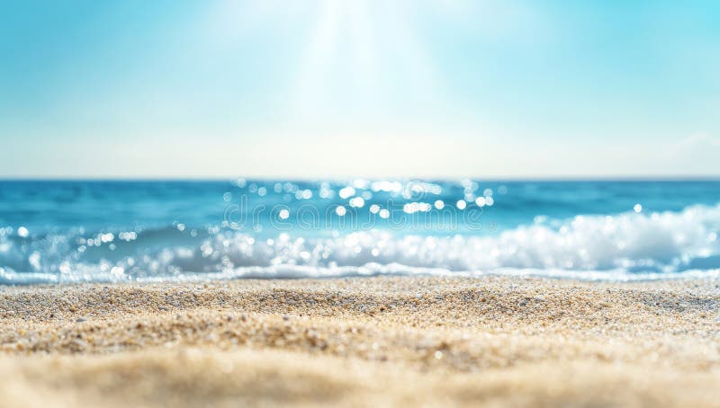 Sunlit Sandy Beach with Sparkling Ocean Waves Under Clear Blue Sky ...