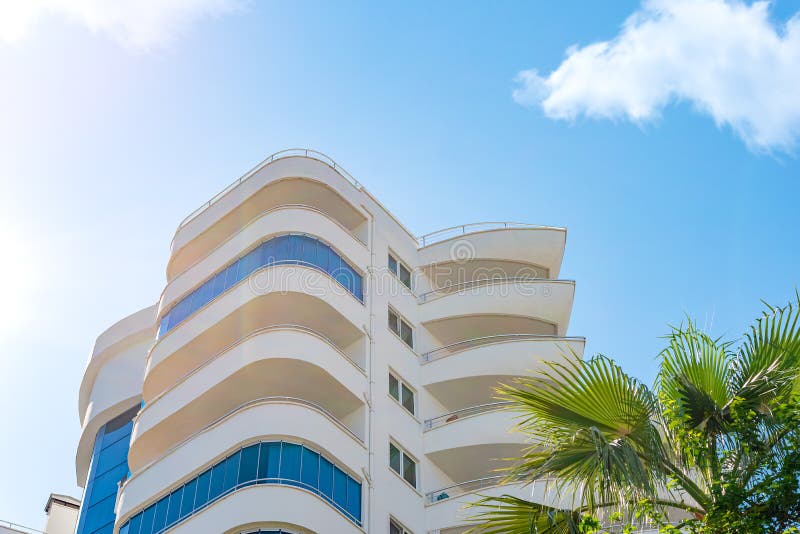 Sunlit Side of a Residential Building with Balconies Stock Image ...