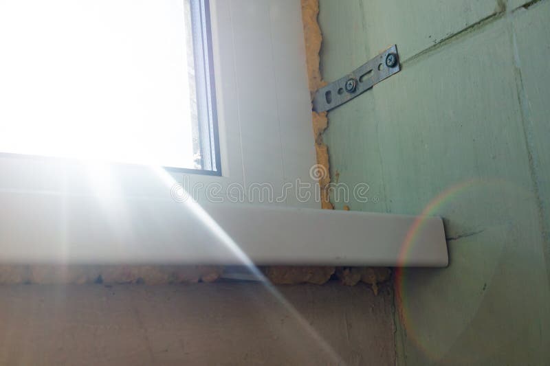 Sunlit Window Frame and Bracket with Insulation Stock Image - Image of ...