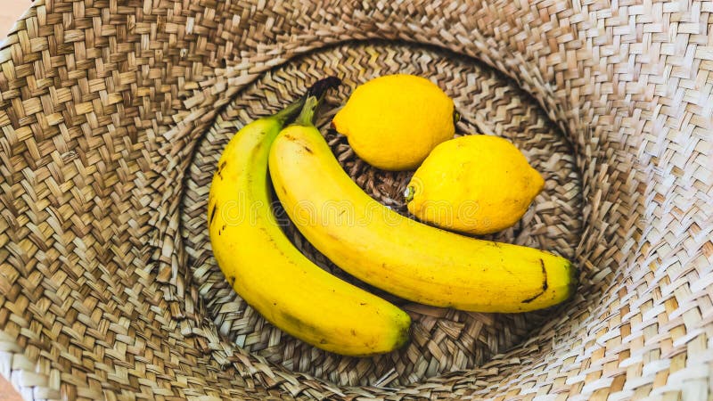 Sunlit Yellow Fruits in Woven Texture Stock Photo - Image of wood ...