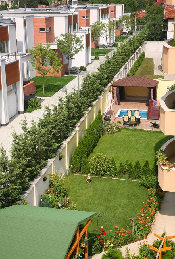 Sunny backyard garden stock image. Image of tree, walled - 10495941