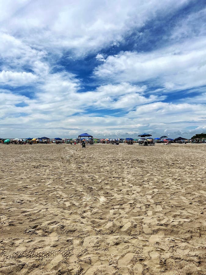 Sunny Beach Day with a Lot of Clouds, Perspective from the Sand Stock ...