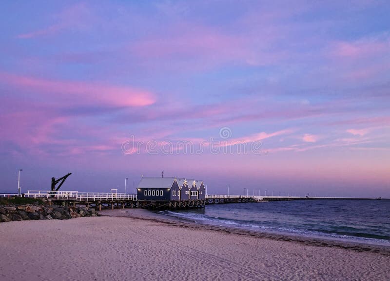 A Beach Area with a Pier and a Blue Sky Above Stock Image - Image of ...