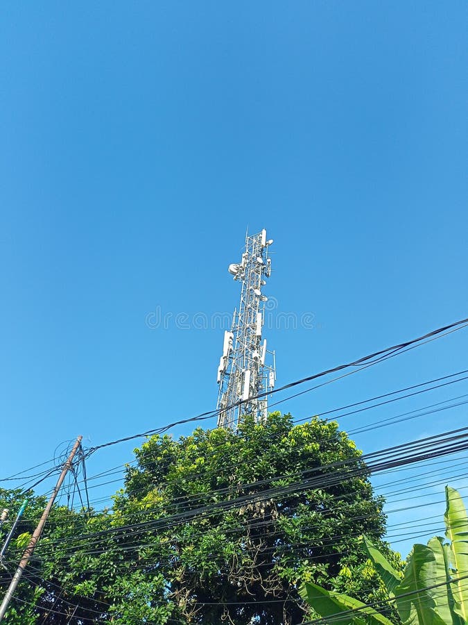 Sunny Blue Sky with Base Transceiver Station Tower Signal, Wire and ...