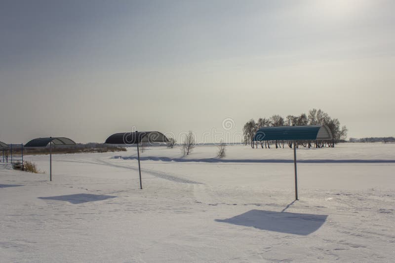Sunny Canopies in the Snow Against the Backdrop of the Snowy Desert ...