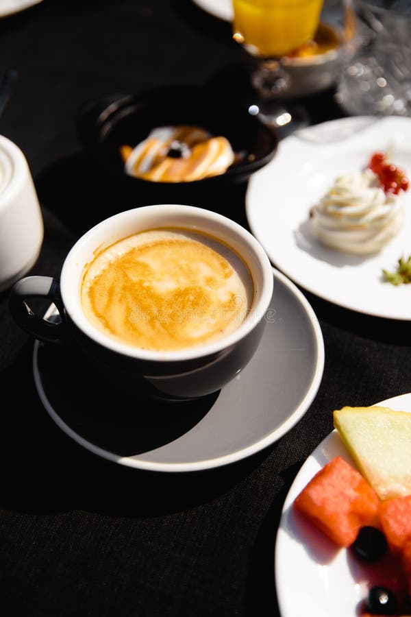 Sunny Cup of Coffee in an Outdoor Garden Table in Direct Sunlight Very ...