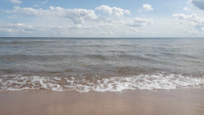 Sunny day at the beach stock image. Image of sunny, beach - 155970297