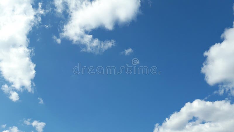 Blue Sky with White Clouds. Partly Cloudy Stock Photo - Image of ...