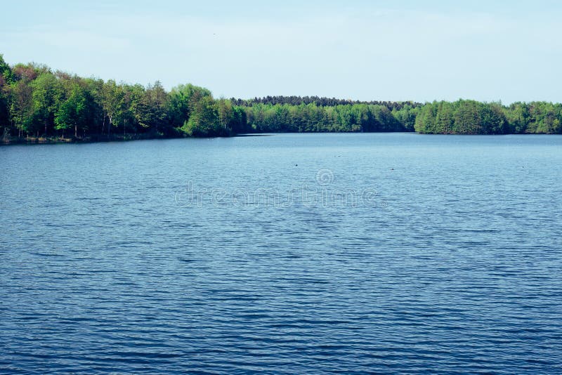 A sunny day at the lake stock image. Image of idyllic - 92420989
