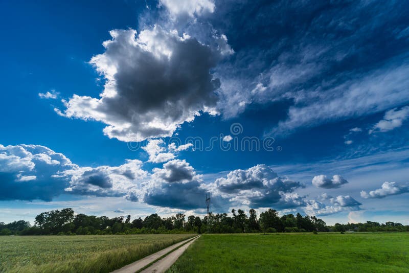 Blue Sky Partly Cloudy Over the Vast Plain. Stock Photo - Image of ...