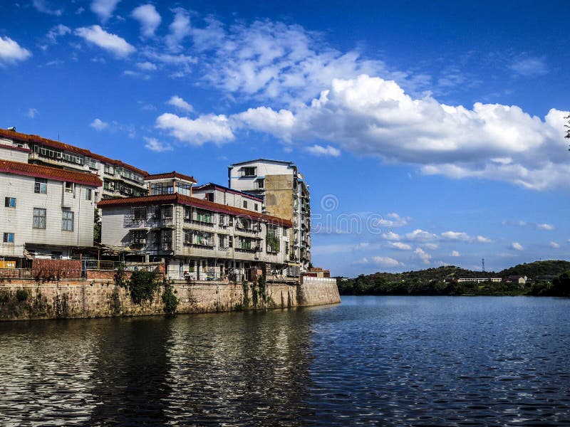 Sunny day, riverside house stock image. Image of house - 139494793