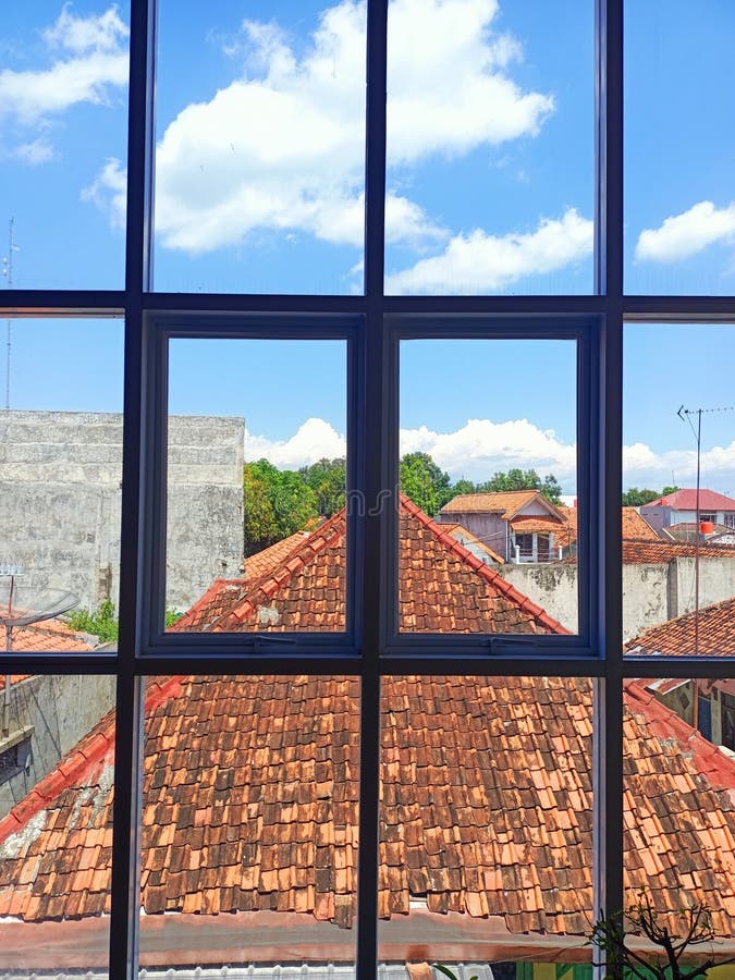 Sunny Day Windows Rooftop stock image. Image of sunny - 262146221