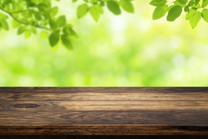 Wooden Table Top with Green Natural View of Green Leaves in Garden and ...