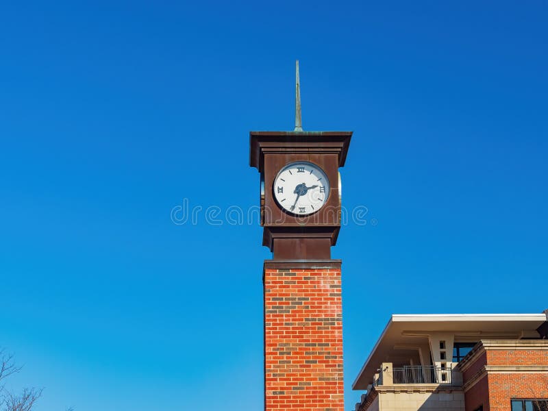 Sunny Exteior View of the Clock Tower of Oklahoma State University ...